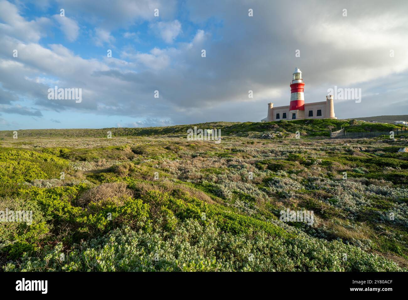 Lighthouse of Cape Agulhas, the geographic southern tip of Africa and ...