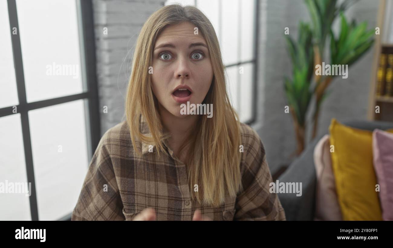 Blonde woman expressing shock hi-res stock photography and images - Alamy