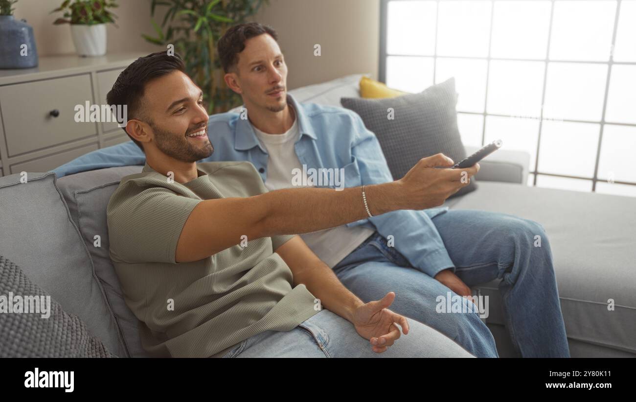 Men relaxing at home, watching tv in a cozy living room, conveying a ...