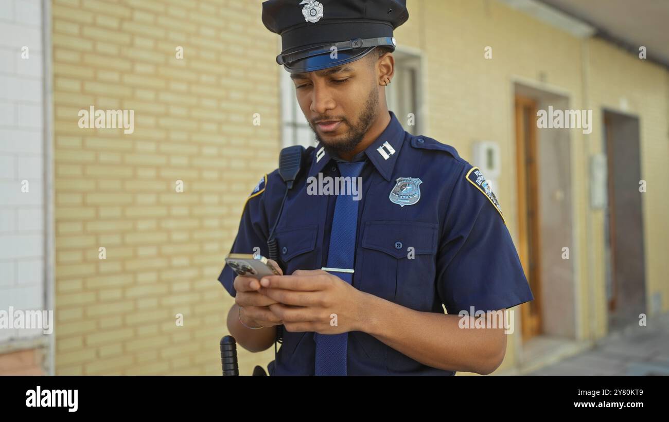 African american police officer communicating hi-res stock photography ...