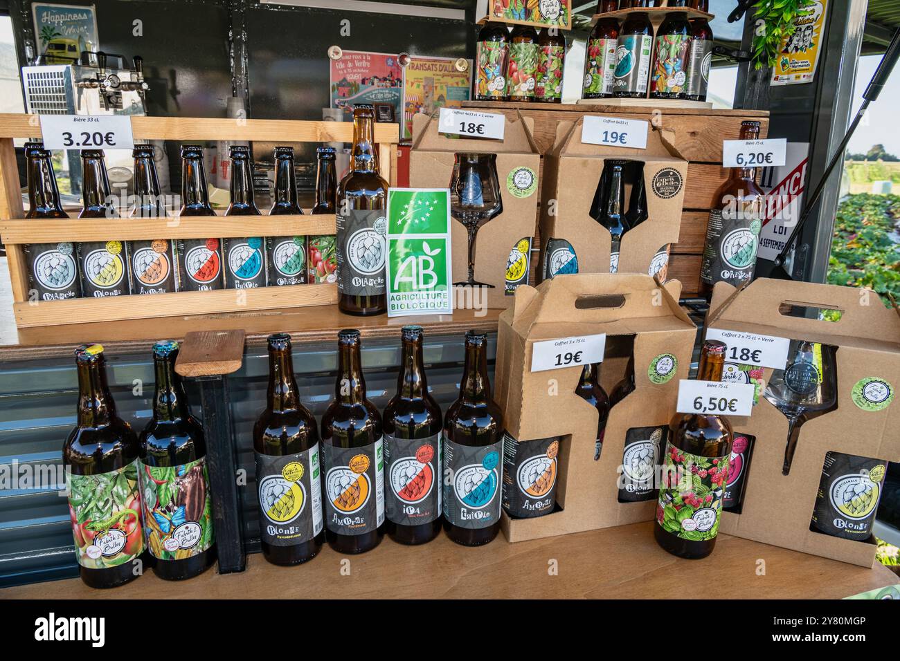 Stand of organic beer at an organic food trade show. AB' logo (organic ...