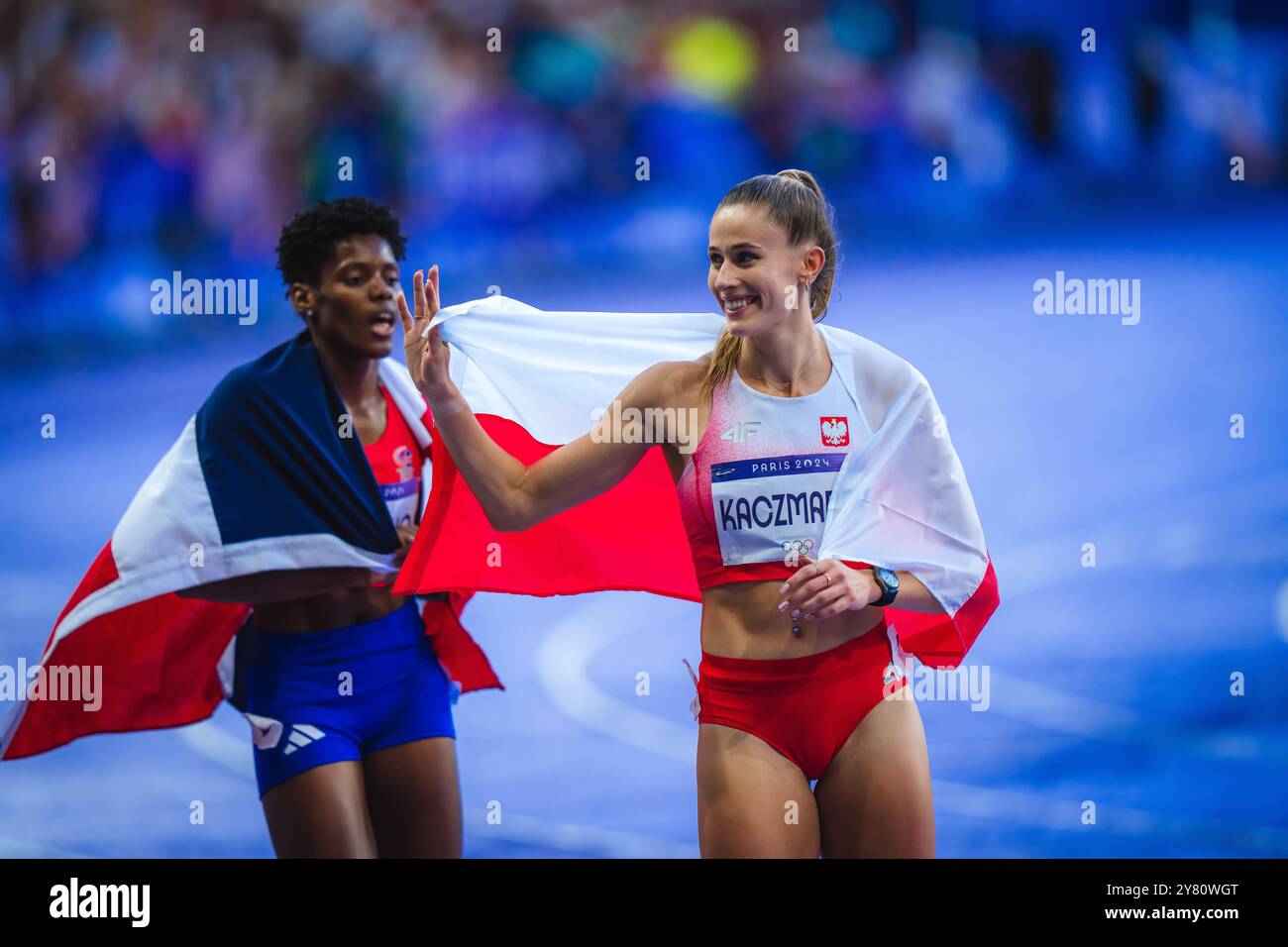 Natalia BUKOWIECKA Kaczmarek celebrating with her country's flag in the ...