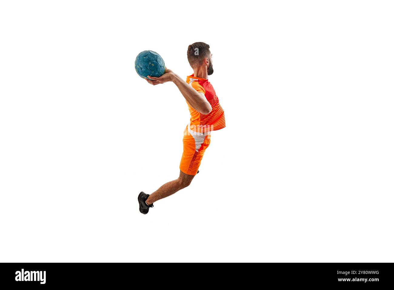 Dynamic image of athletic muscular young man, handball player in motion ...