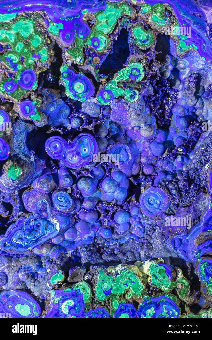 Abstract background of blue-green stone - azurite and malachite. Bright ...