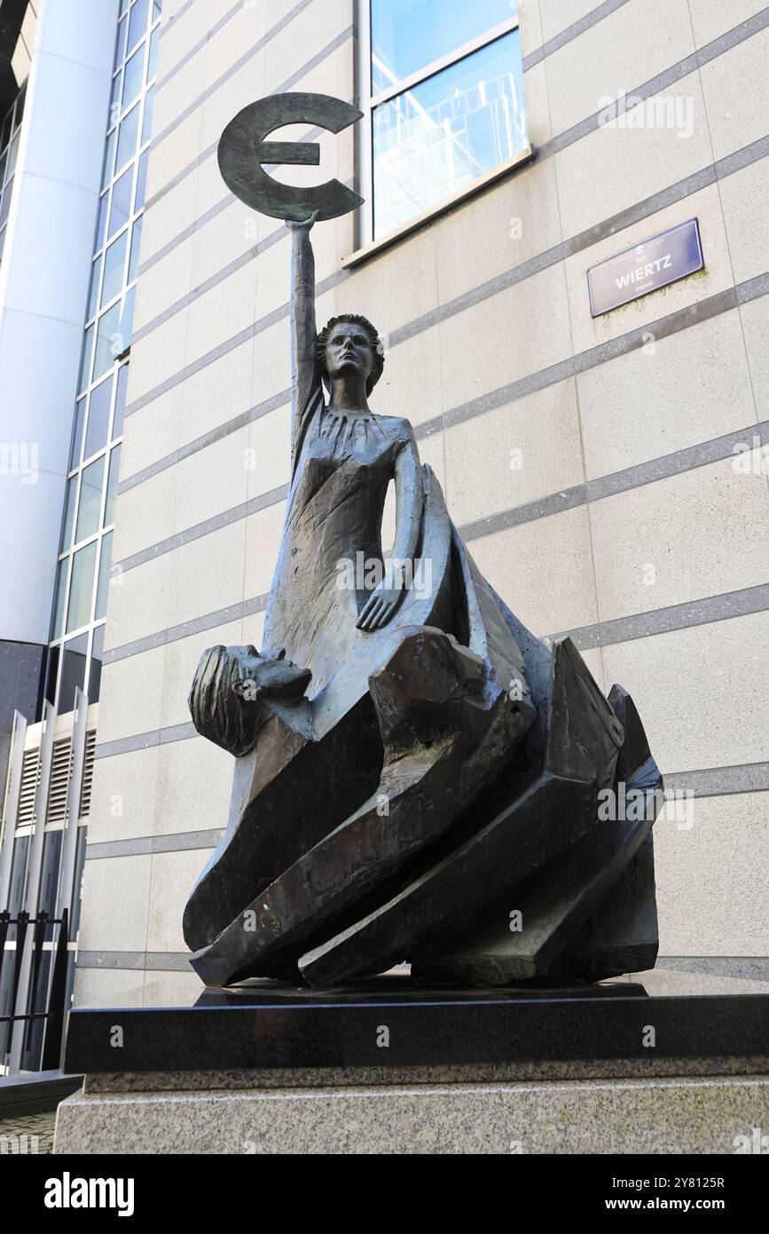 Statue of the goddess Europa with Euro currency symbol in front of the ...