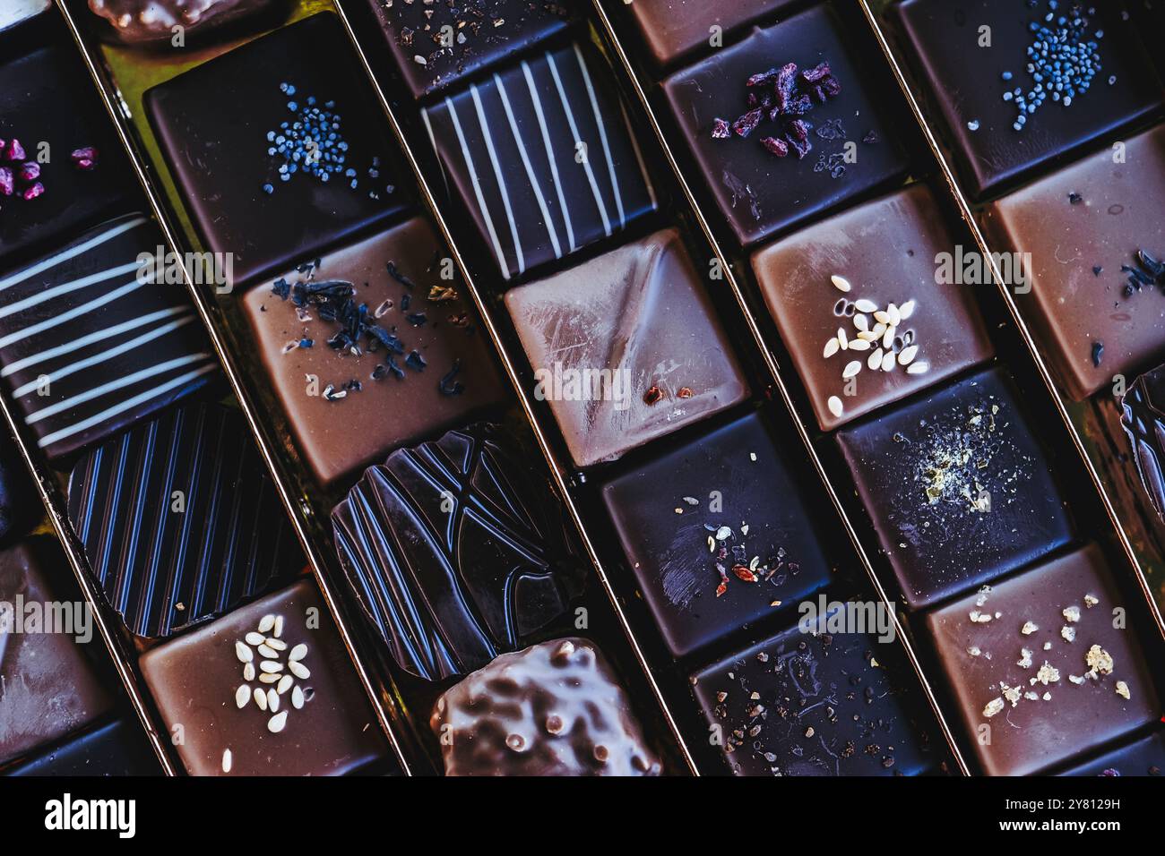 Assortment of chocolates made by an artisan in a box Stock Photo - Alamy