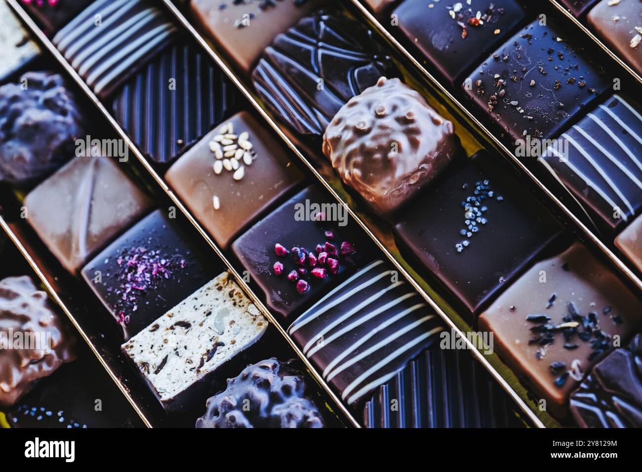 Assortment of chocolates made by an artisan in a box Stock Photo - Alamy