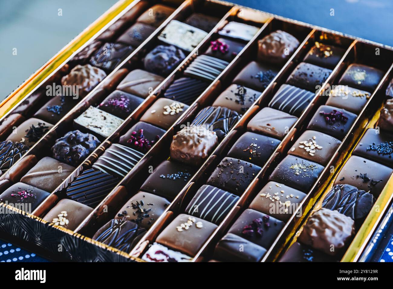 Assortment of chocolates made by an artisan in a box Stock Photo - Alamy