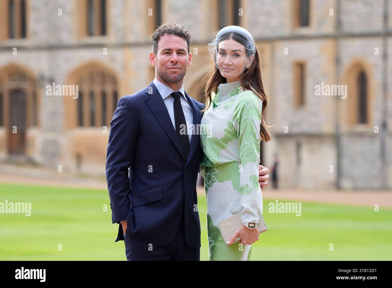 Mark Cavendish, left, with his wife Peta, right, pose for a photo at ...