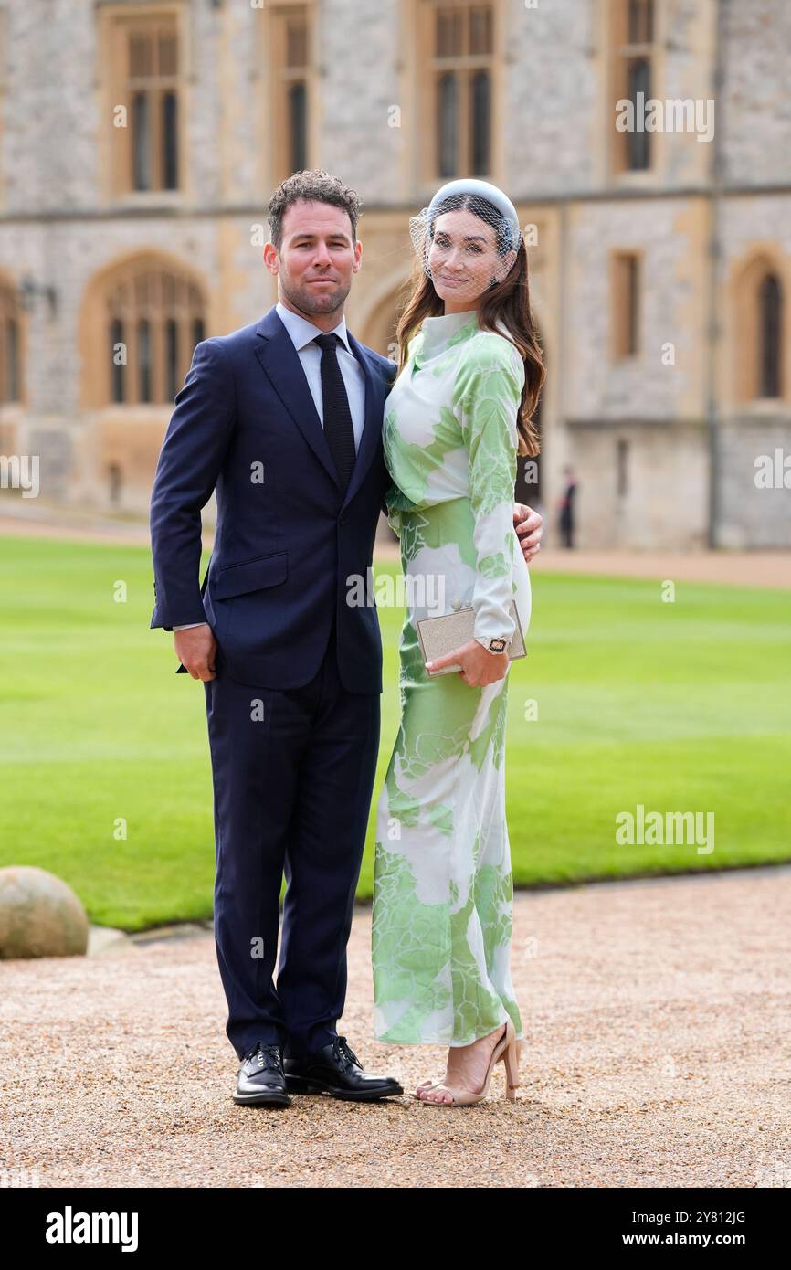 Mark Cavendish, left, with his wife Peta, right, pose for a photo at ...