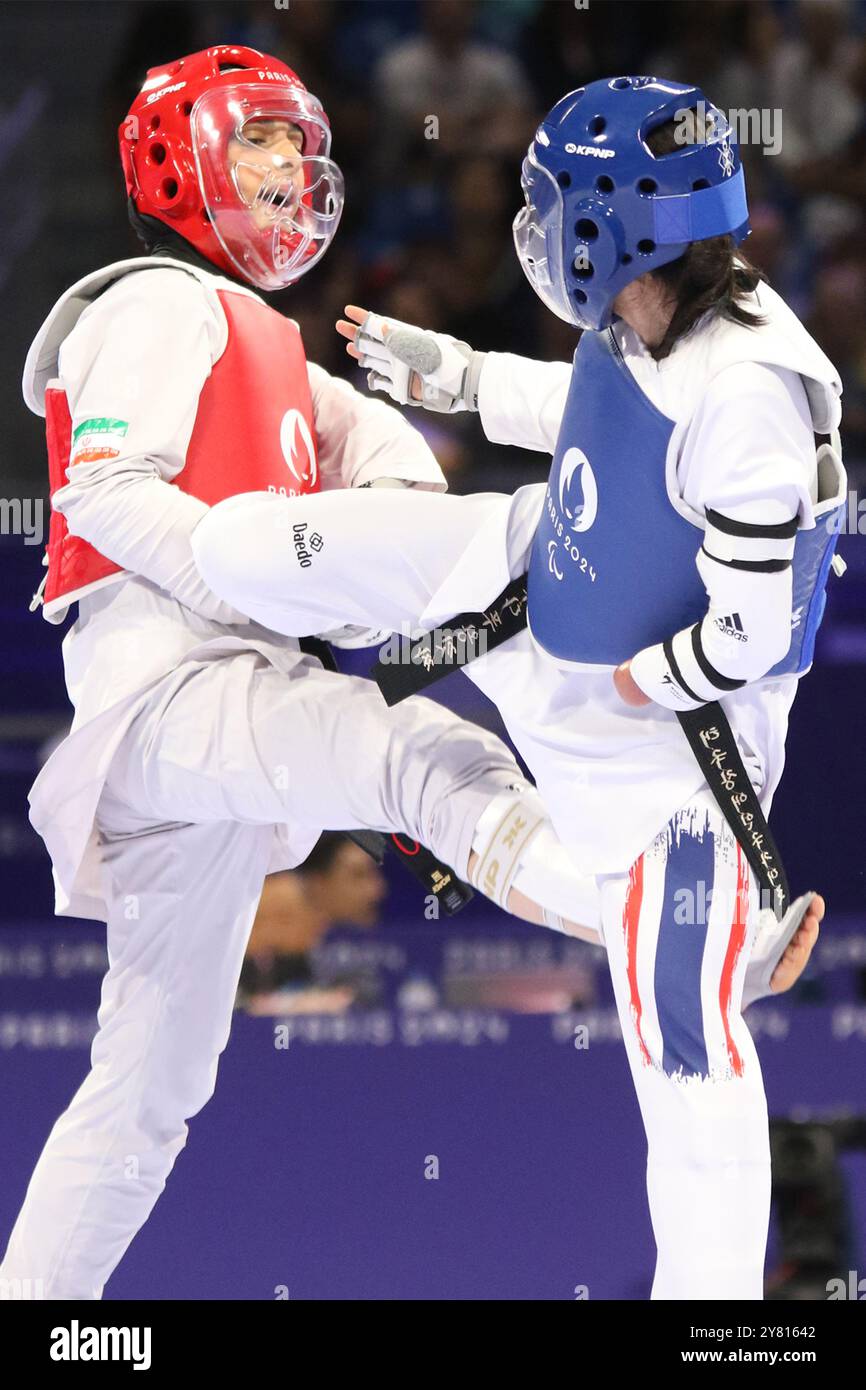 Khwansuda PHUANGKITCHA of Thailand (blue) wins the bronze medal vs ...