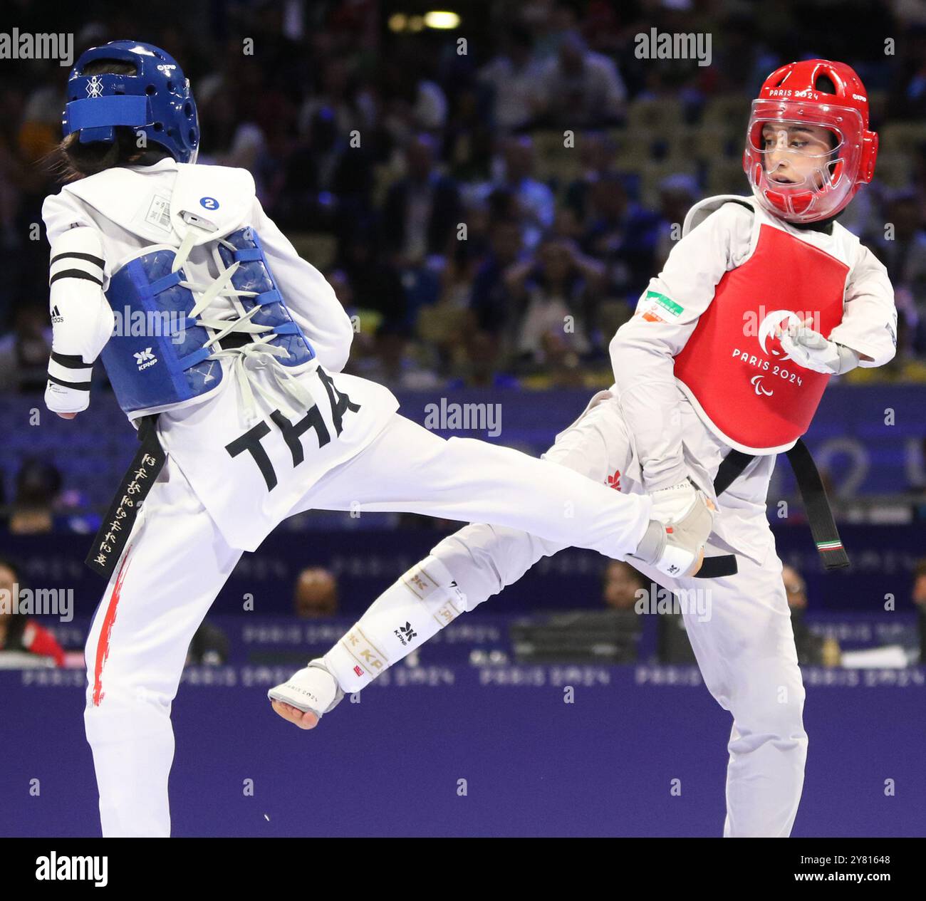 Khwansuda PHUANGKITCHA of Thailand (blue) wins the bronze medal vs ...