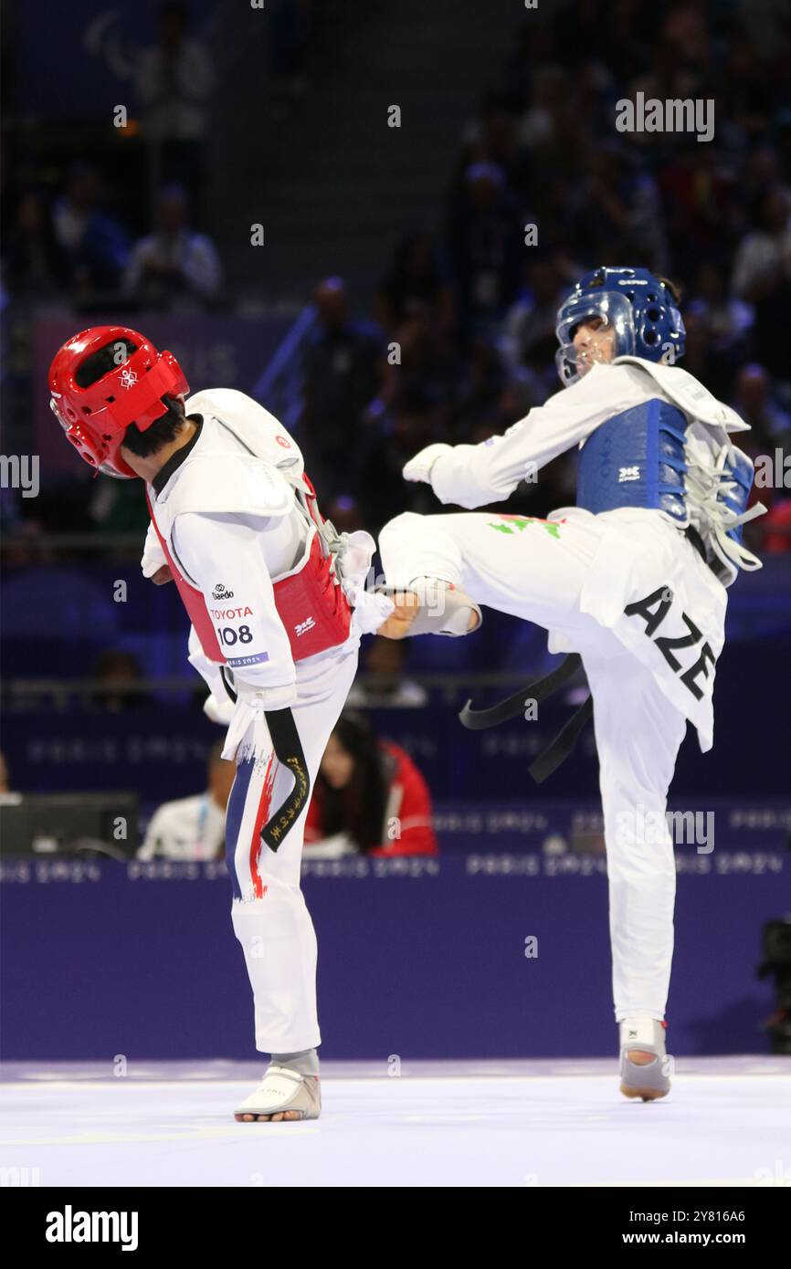 Sabir ZEYNALOV of Azerbaijan (blue) wins bronze vs Thanwa KAENKHAM of ...