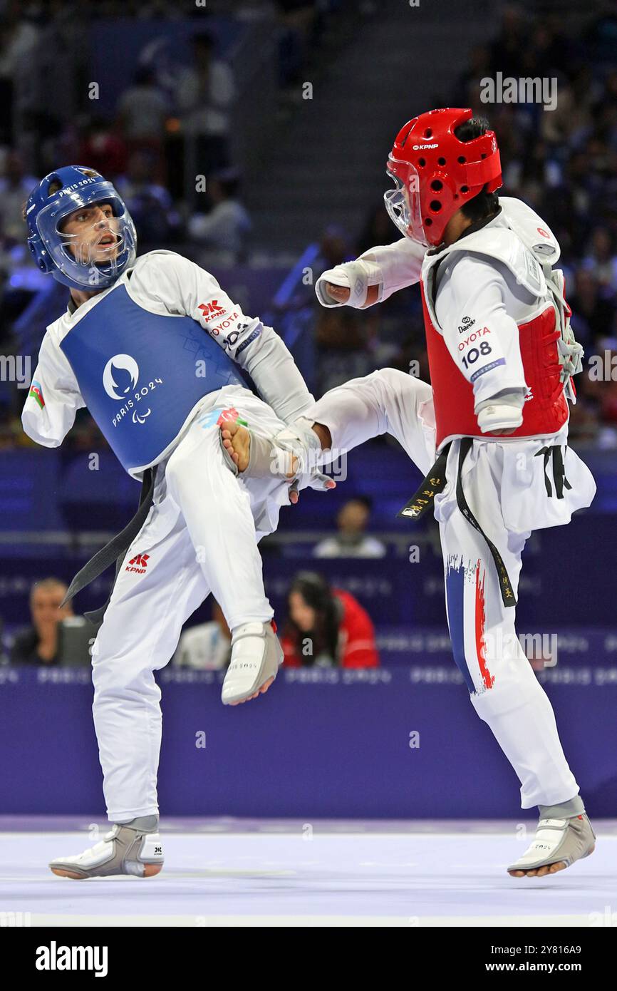 Sabir ZEYNALOV of Azerbaijan (blue) wins bronze vs Thanwa KAENKHAM of ...