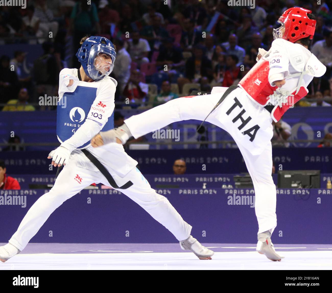 Sabir ZEYNALOV of Azerbaijan (blue) wins bronze vs Thanwa KAENKHAM of ...