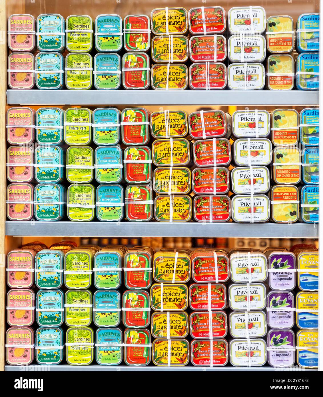 Display of a cans of La Belle Iloise sardines in a shop window. Le ...