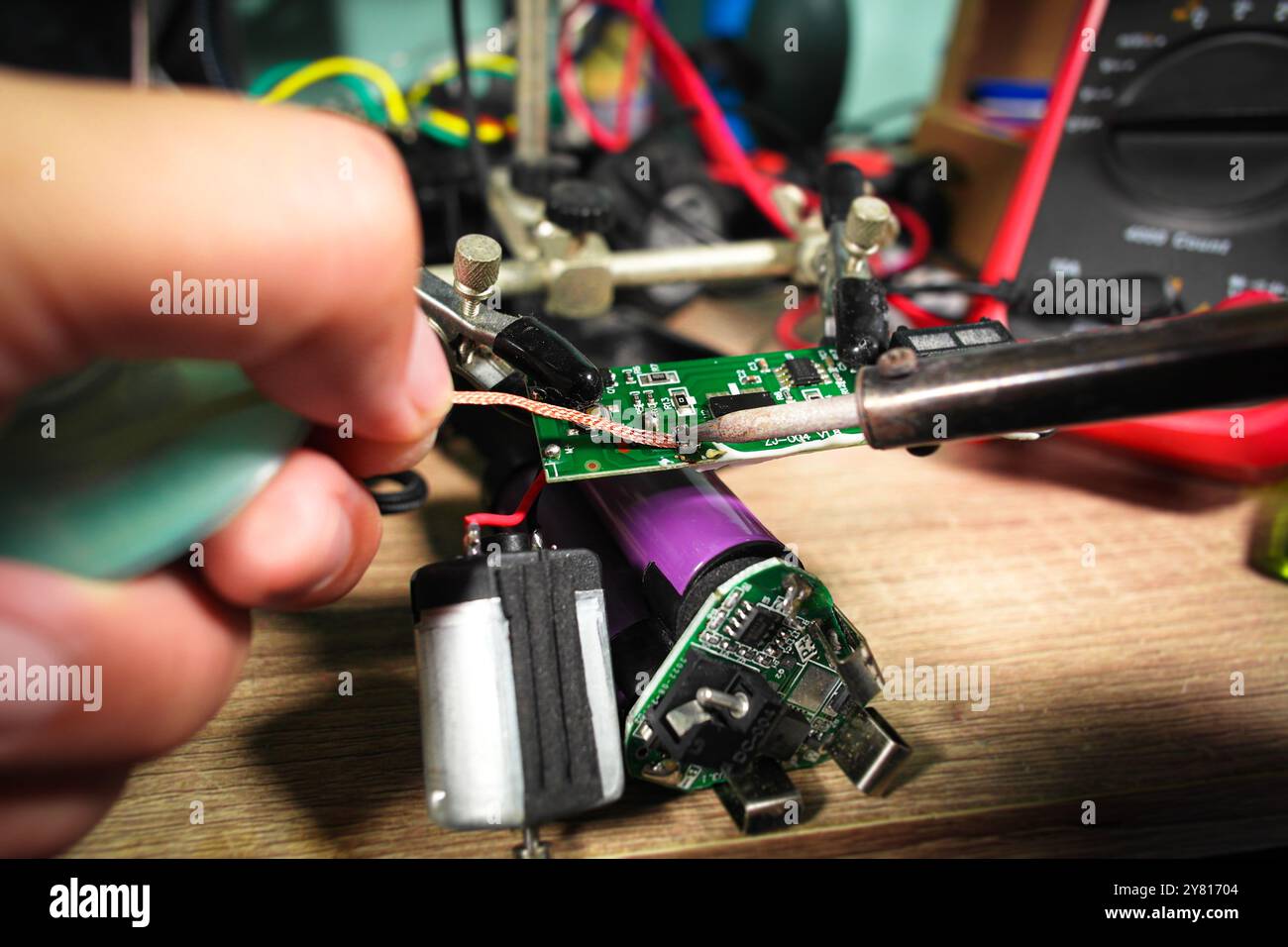 The extraction of lead using desoldering wire or solder wick and ...