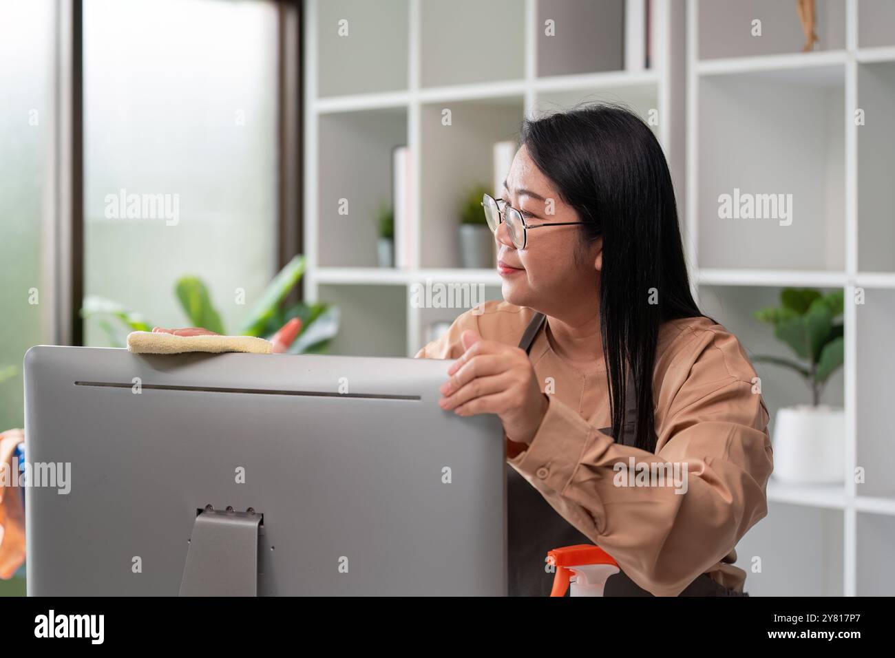 Housekeeping Professional Detailed Cleaning Computer Screen in Office ...