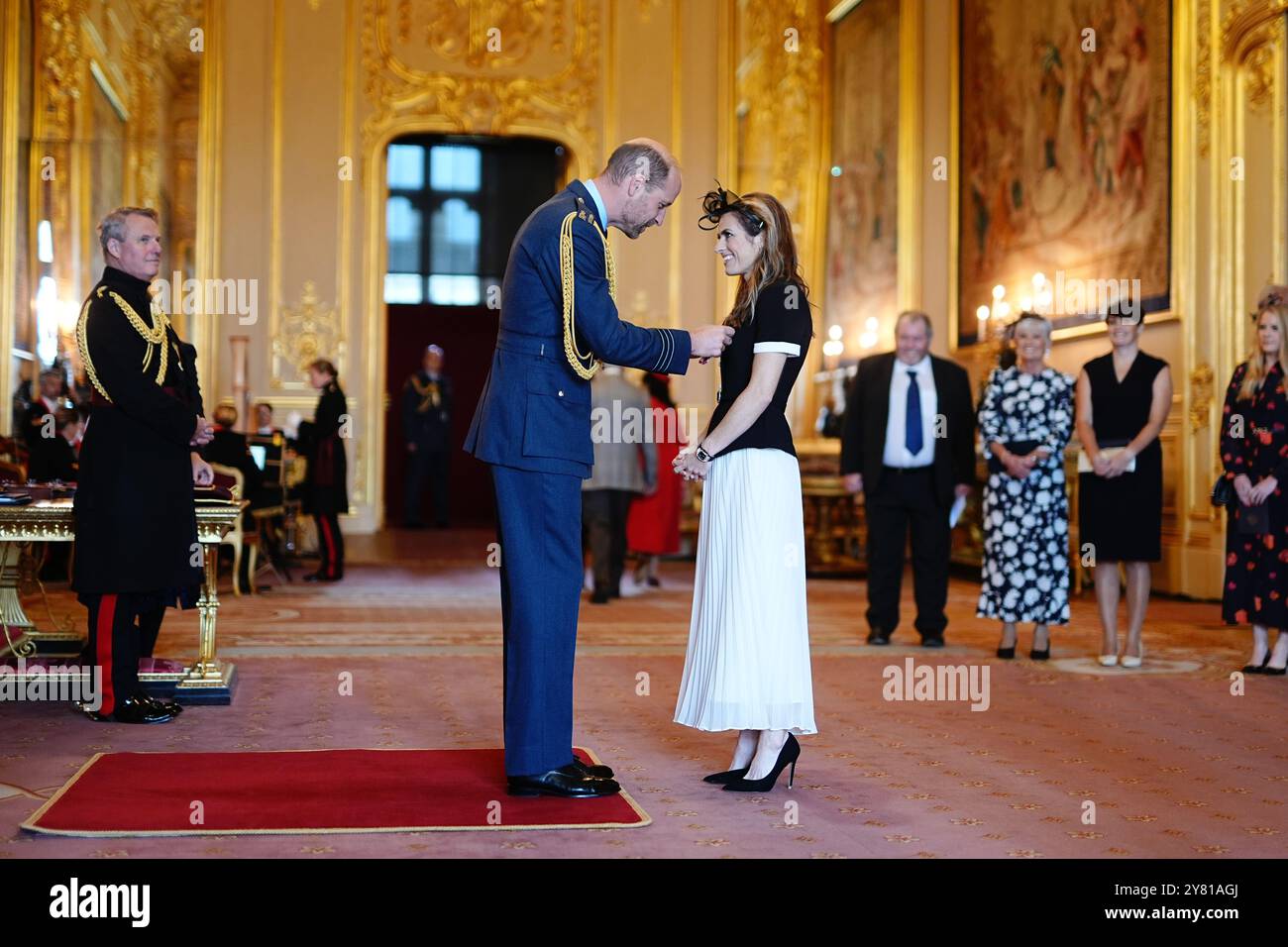 Miss Karen Carney, from Surbiton, Footballer, is made an Officer of the ...