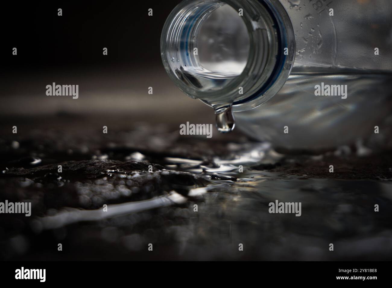 Water dripping from a plastic bottle Stock Photo - Alamy