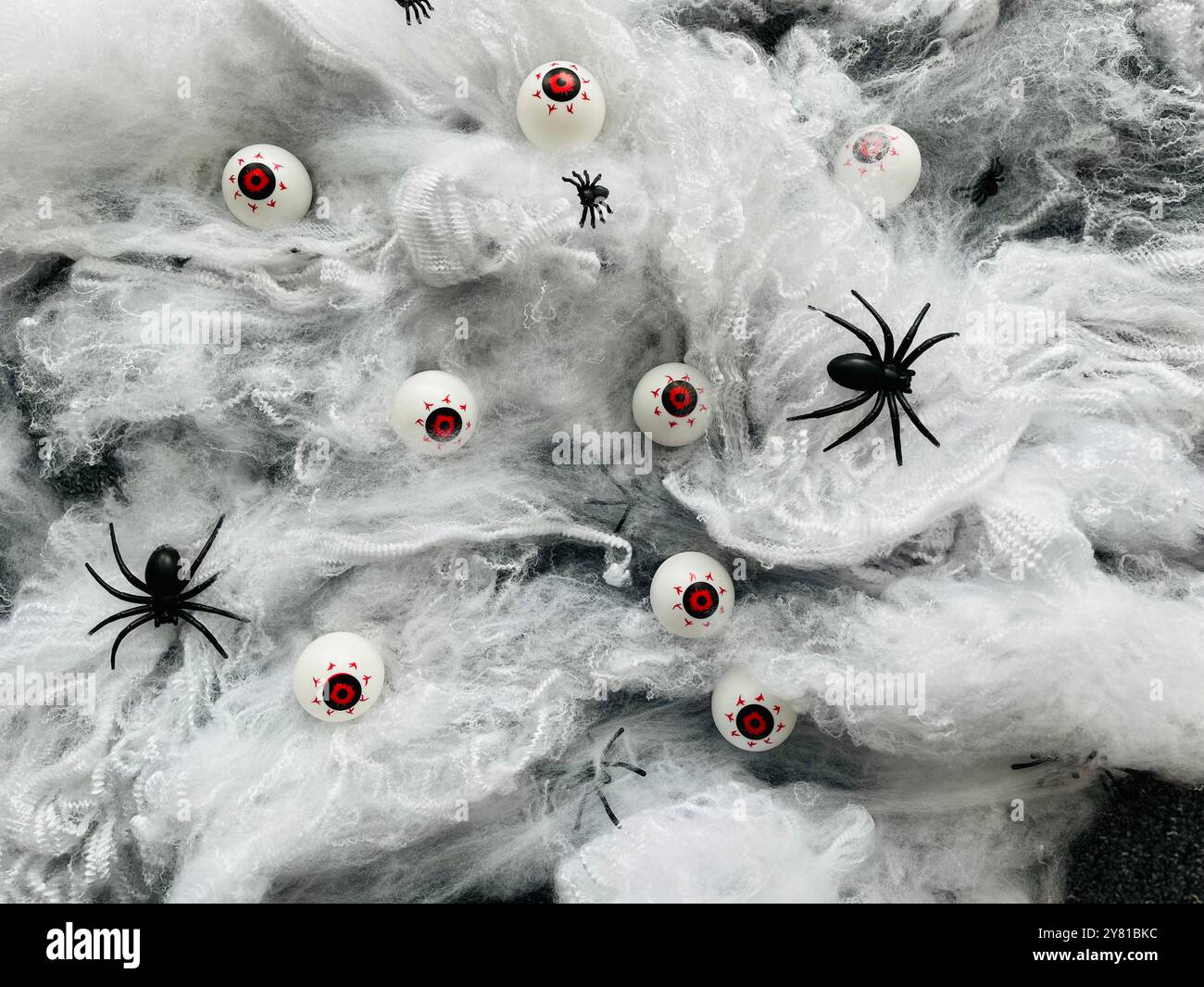 Eyeball with red blood vessels in the legs of an Stock Photo - Alamy