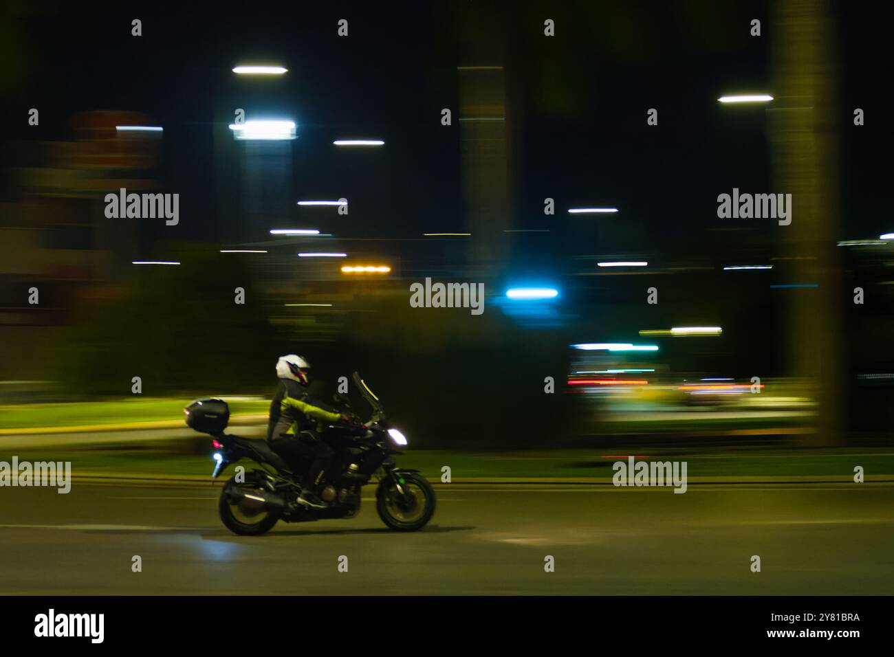 a passenger car at night with a blurred background made using the ...