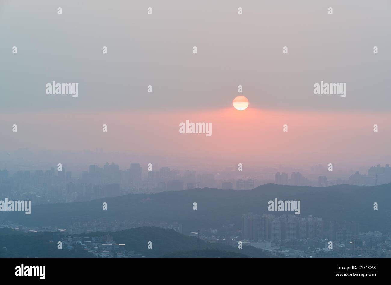 A breathtaking panoramic view of Taipei City at sunset, with the city ...