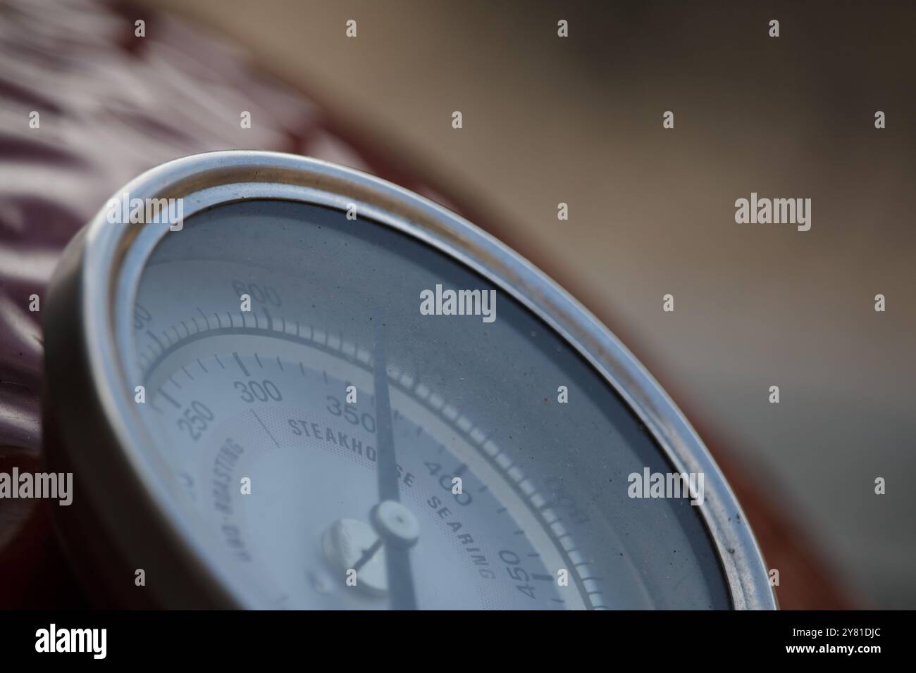 Pointer showing temperature on thermometer on a barbecue Stock Photo ...
