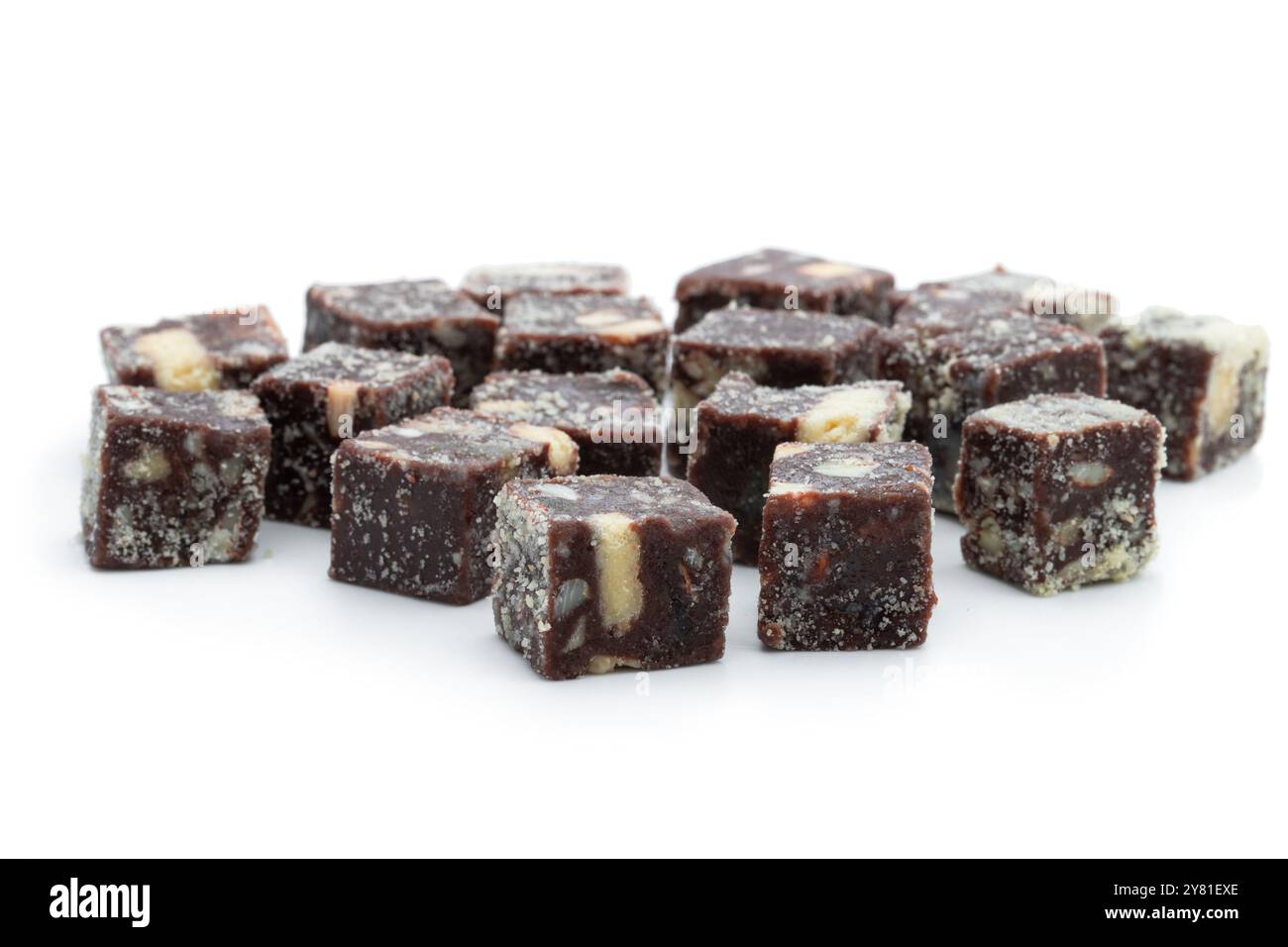 Chocolate cubes with nuts and cookies isolated on white Stock Photo - Alamy