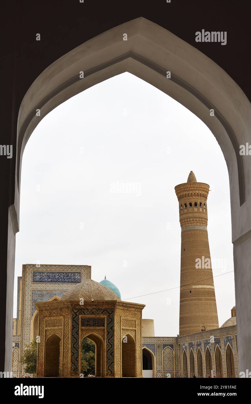 Inside the Kalon mosque, view from arch on square and minaret Stock ...