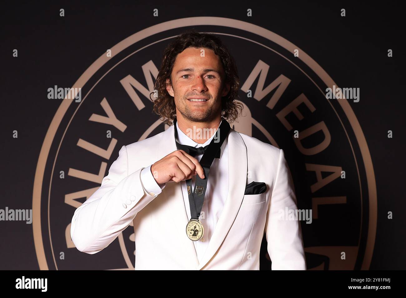 Sydney, Australia. 02nd Oct, 2024. Nicho Hynes of the Sharks poses with ...