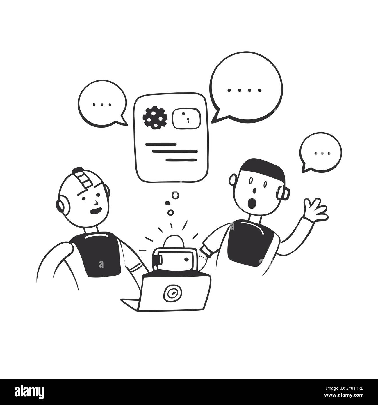 Two robots have a conversation in front of a laptop computer. They are ...