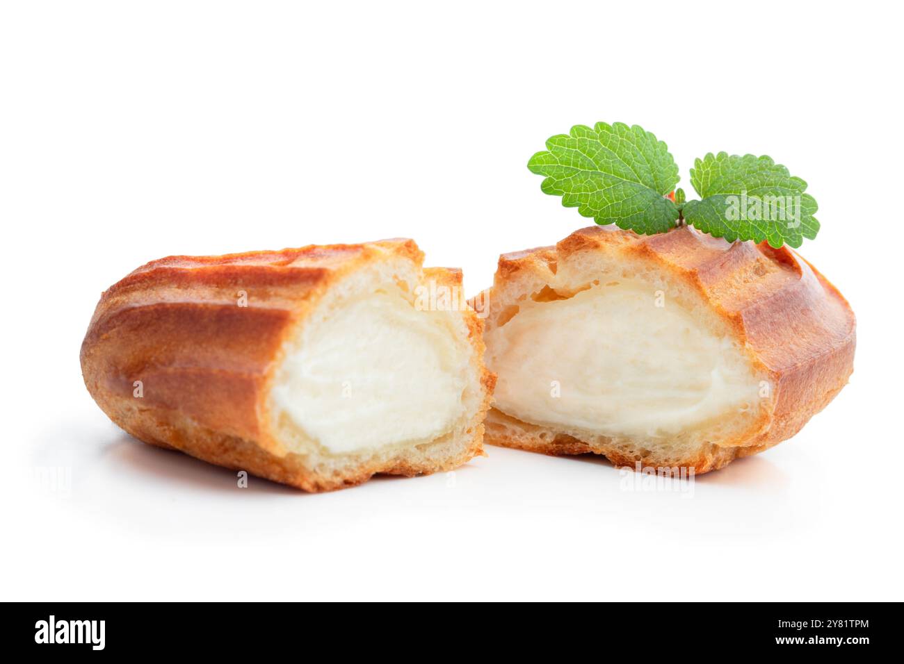 Eclair with whipped cream isolated on white Stock Photo - Alamy
