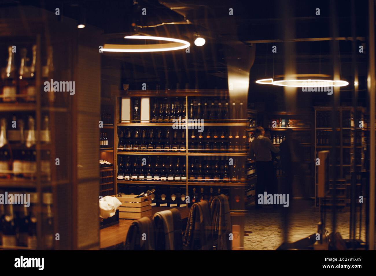 Interior shot of wine collection in elite alcohol store. Cellar in ...