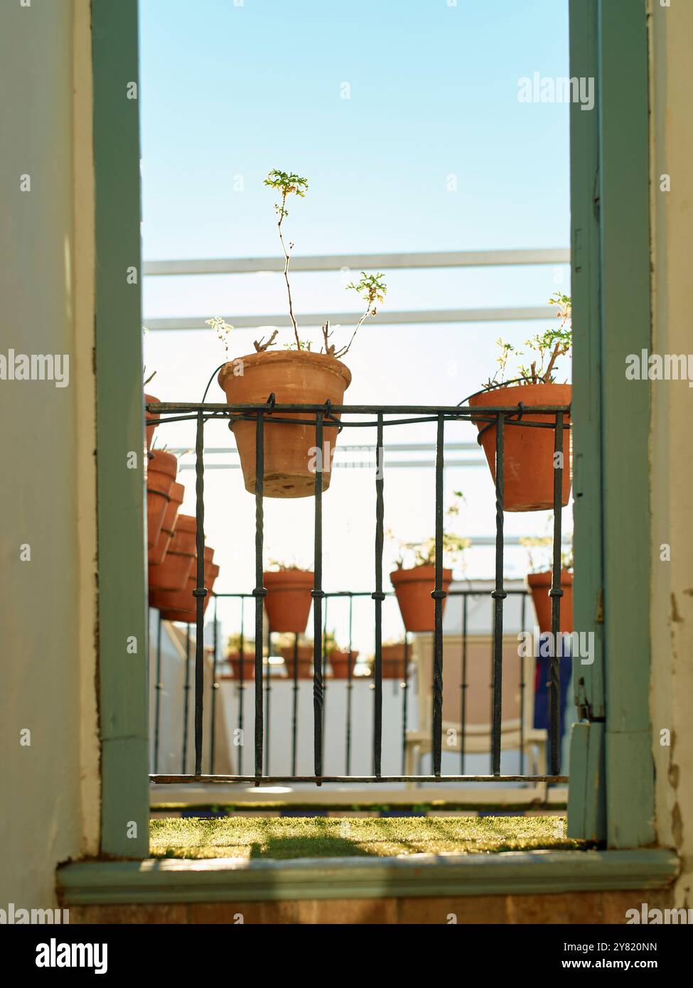 Balcony viewed through window hi-res stock photography and images - Alamy