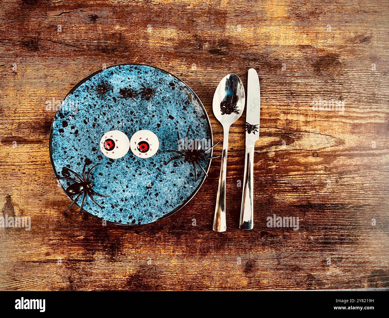 Hauntingly creative table arrangement: Vertical Stock Photo - Alamy