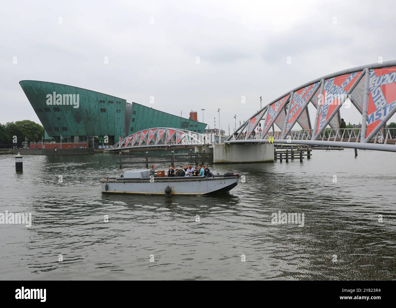 AMSTERDAM, NETHERLANDS-JUNE 11,2016:Unidentified Young Men enjoying ...