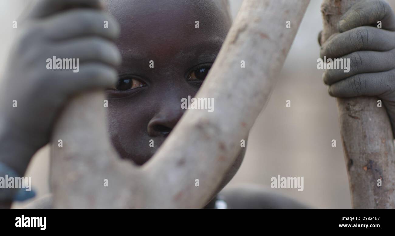 Portrait of a smiling Mundari tribe boy, Central Equatoria, Terekeka, South Sudan Stock Photo ...