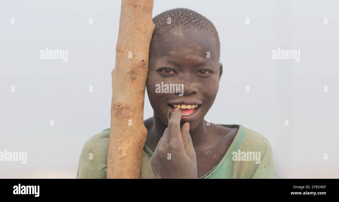 Portrait of a smiling Mundari tribe boy, Central Equatoria, Terekeka, South Sudan Stock Photo ...
