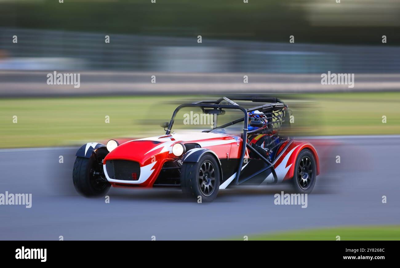 Race car racing at high speed on speed track with motion blur, extreme ...