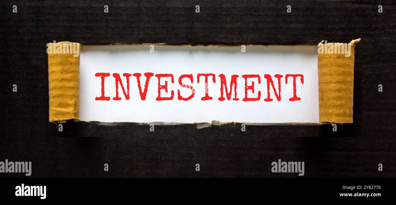 Investment symbol. Concept word Investment on beautiful white paper ...