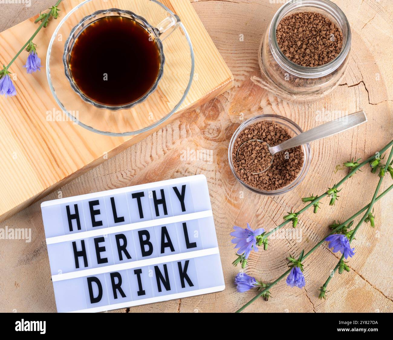 Shot illustrated herbal medicine concept. Beverage chicory tea in glass ...