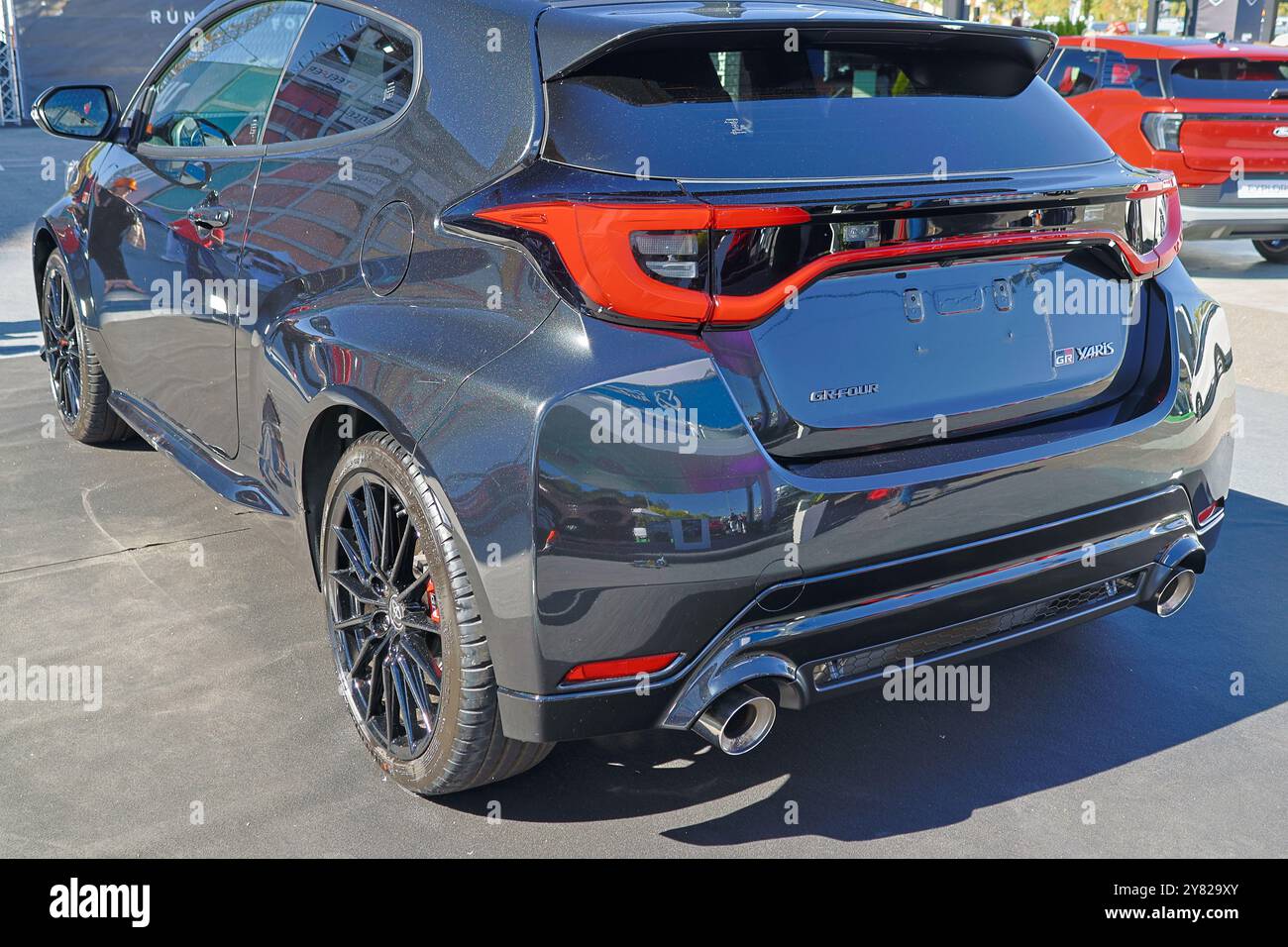 Brand new toyota gr yaris gr is parked at a car dealership, showing off ...