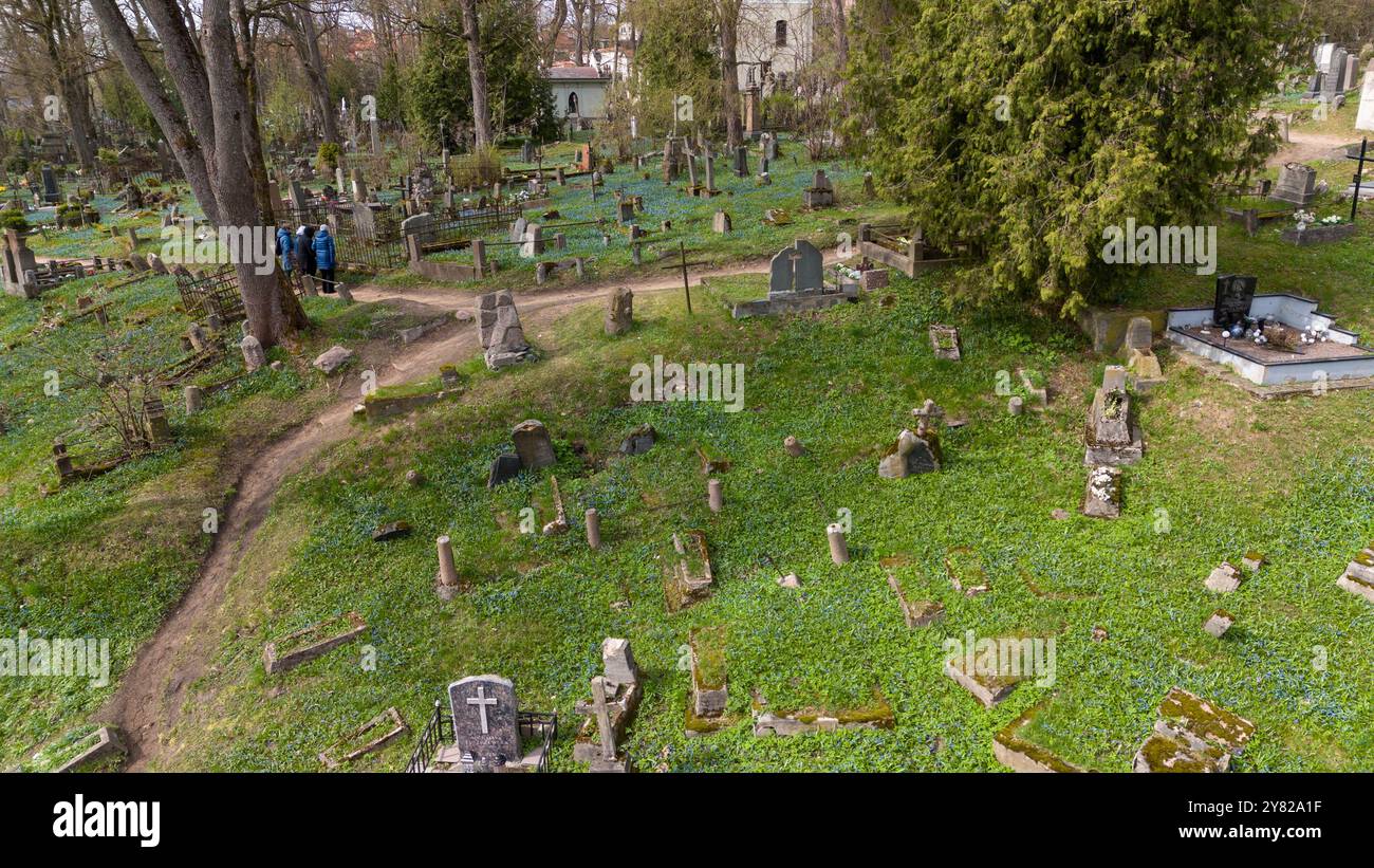 Aerial view of a cemetery with numerous gravestones and memorials ...