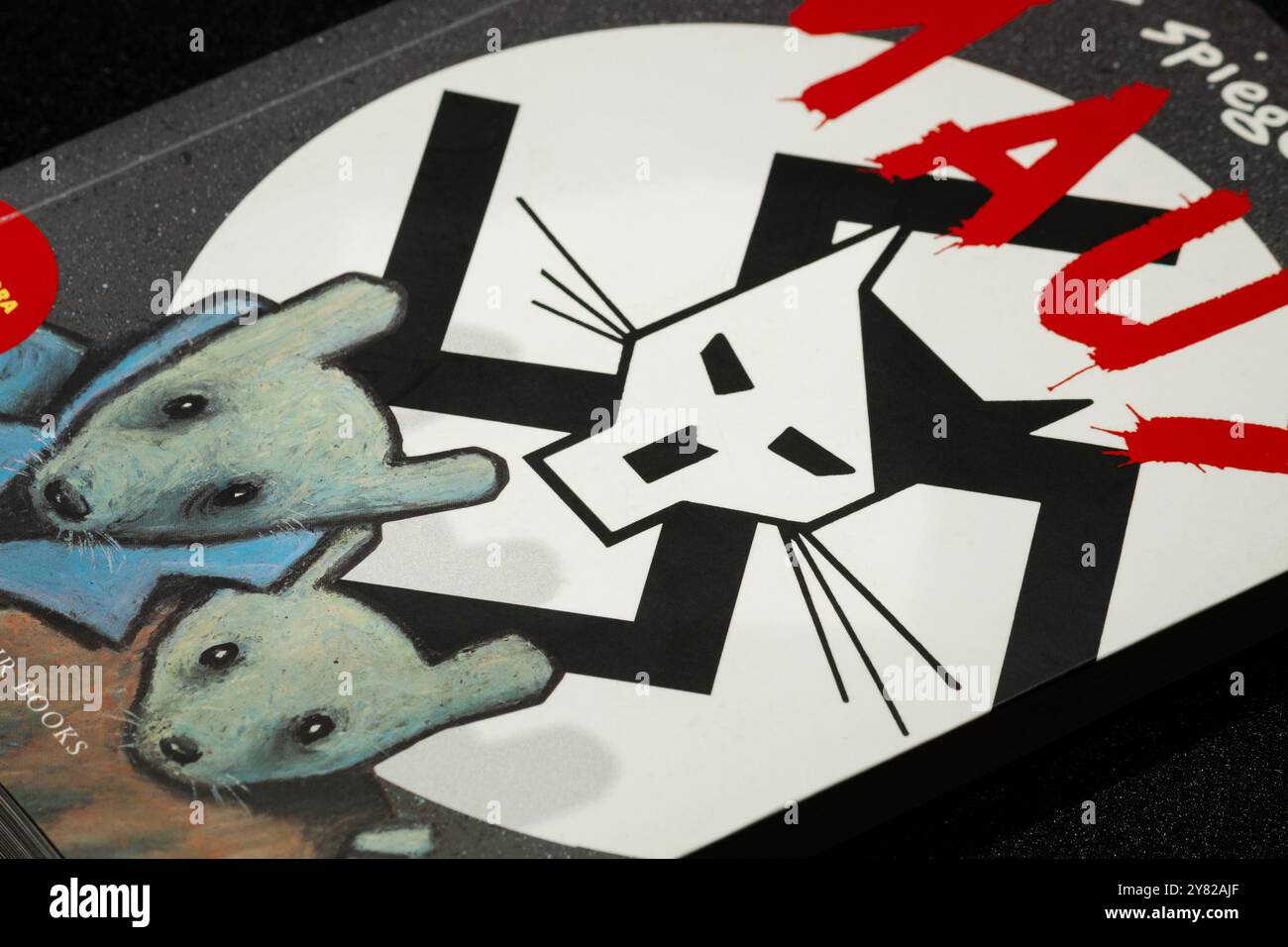 Close up to Maus Graphic novel book front page with black background ...