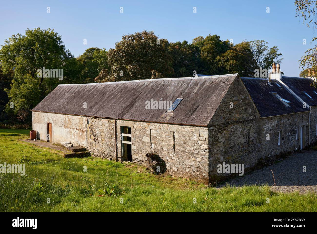 Rear elevation of converted Scottish farmhouse and barn Stock Photo - Alamy