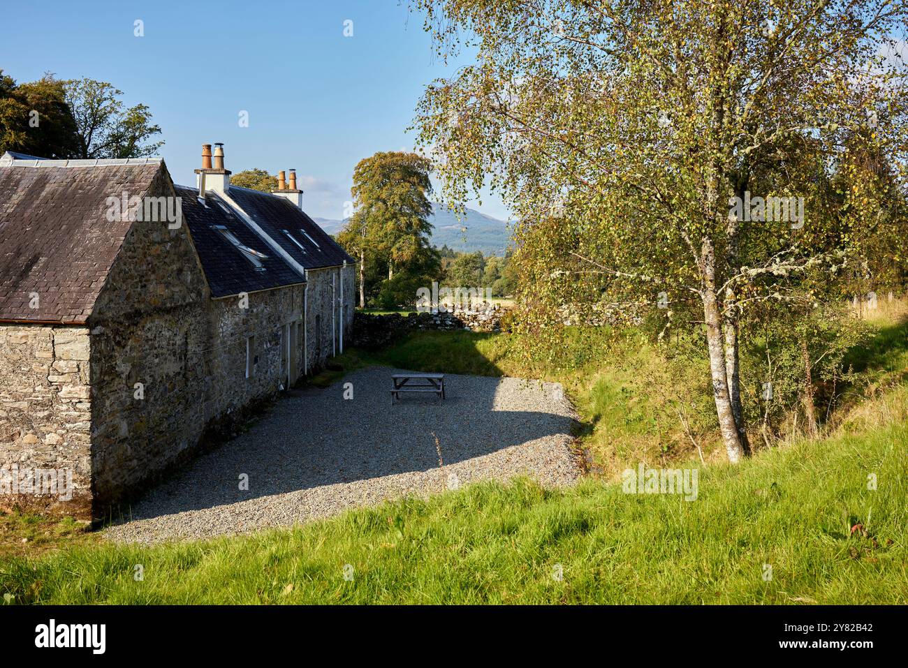 Rear elevation of converted Scottish farmhouse and barn Stock Photo - Alamy