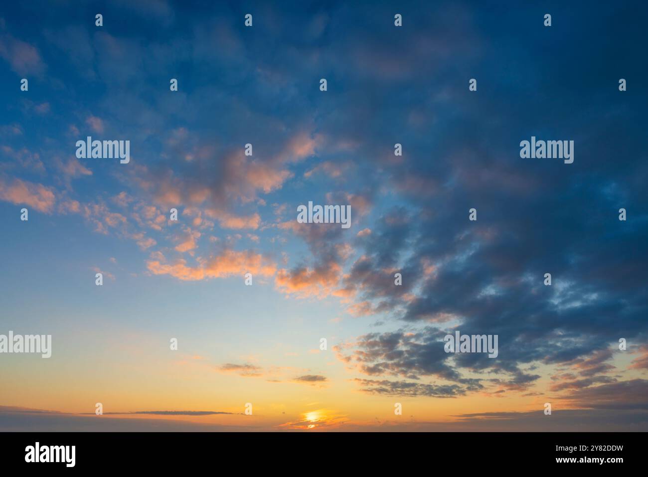 Glowing real sky at sunset texture background overlay. Dramatic red ...