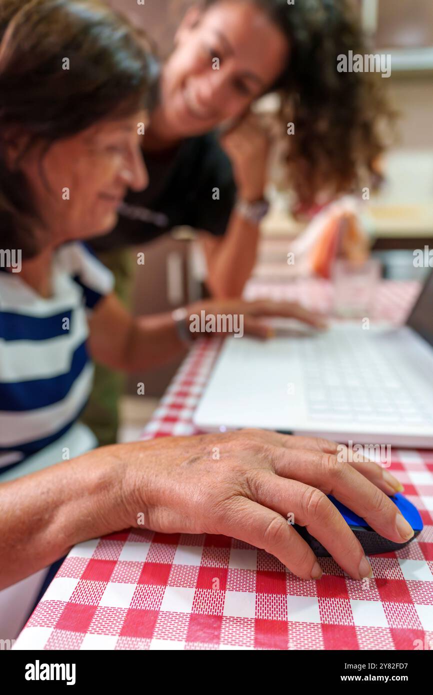 Adult daughter teaches senior hi-res stock photography and images - Alamy