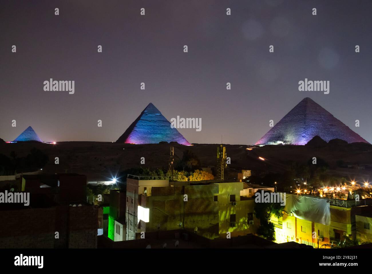 The Great Pyramid complex enlighted at night, Giza, Egypt Stock Photo ...